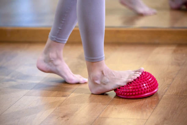 Using A Ball to Massage Feet – FitBeast